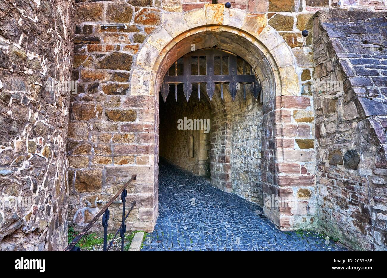 Stone wall with trap gate in Wernigerode Castle Stock Photo - Alamy
