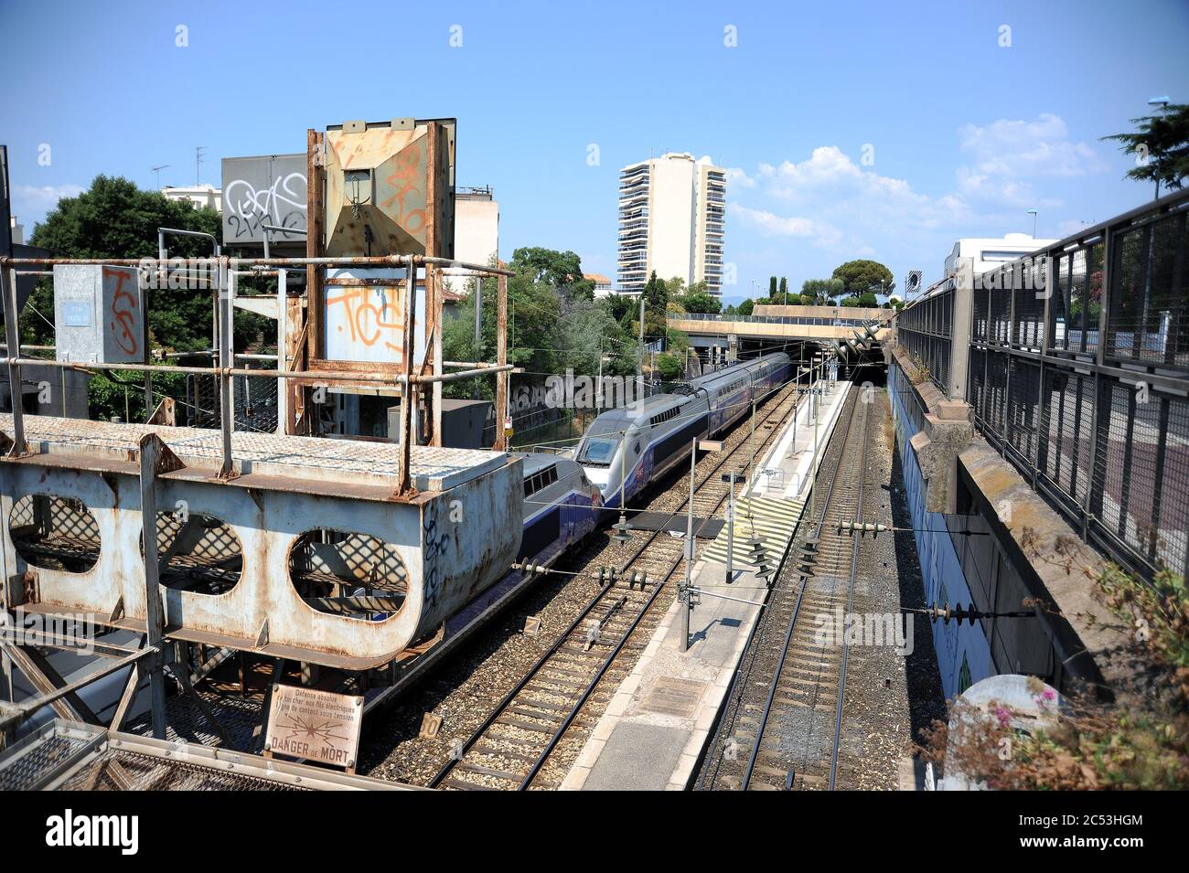 Looking west along station as a west-bound TGV enters. St Raphael Stock ...