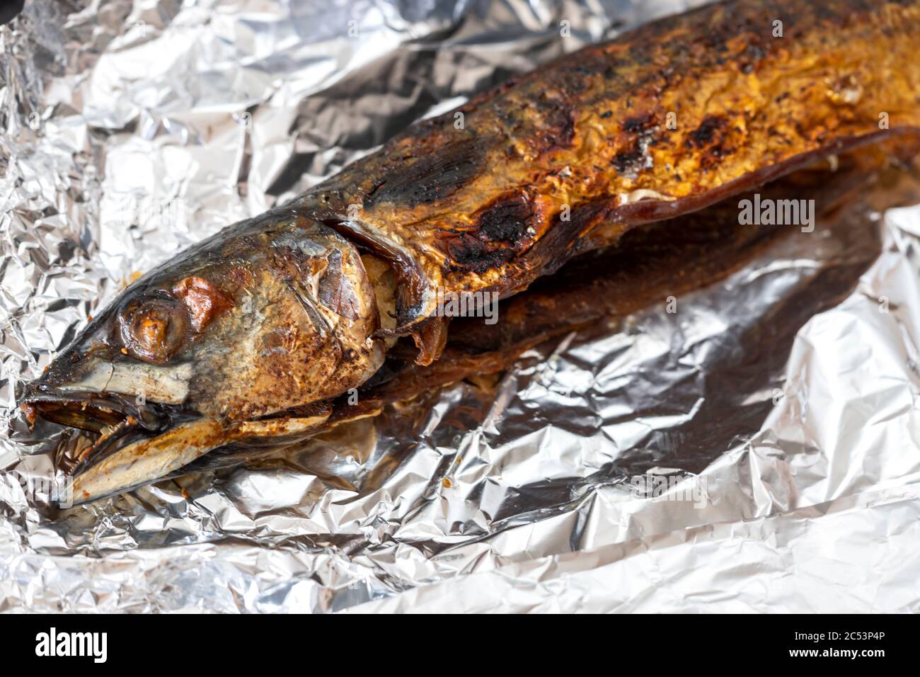 Smoked fish and aluminium foil hi-res stock photography and images - Alamy