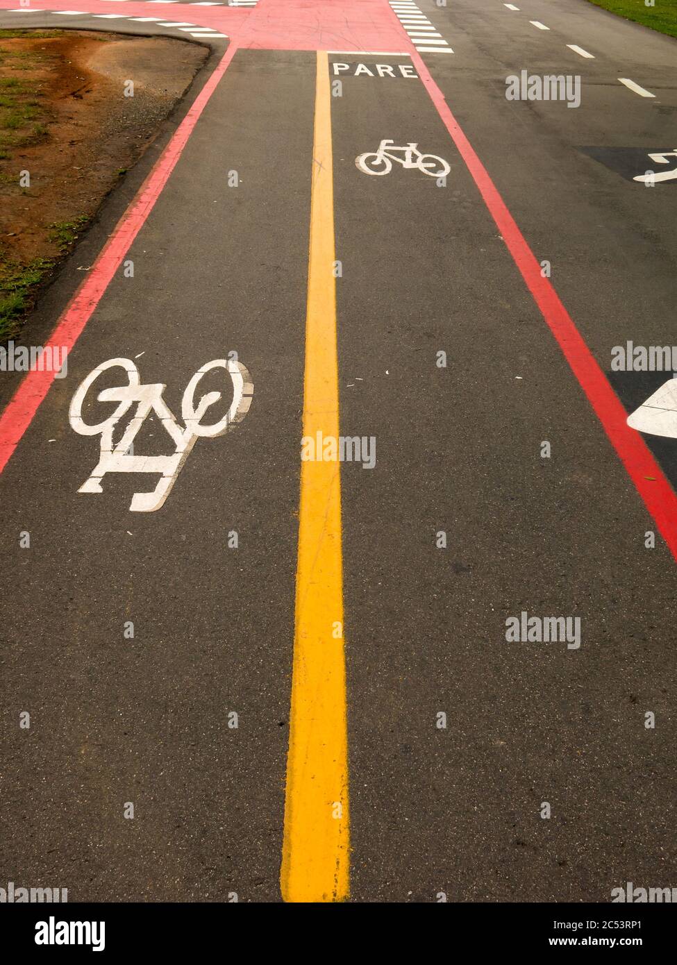 Bike Lane signs on streets ground Stock Photo - Alamy