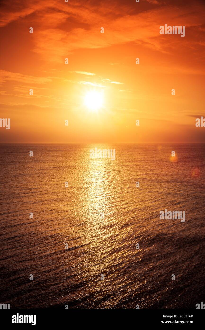 Red sunset by the sea Stock Photo - Alamy