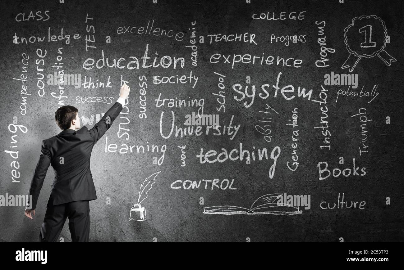 Man draw on chalkboard Stock Photo - Alamy