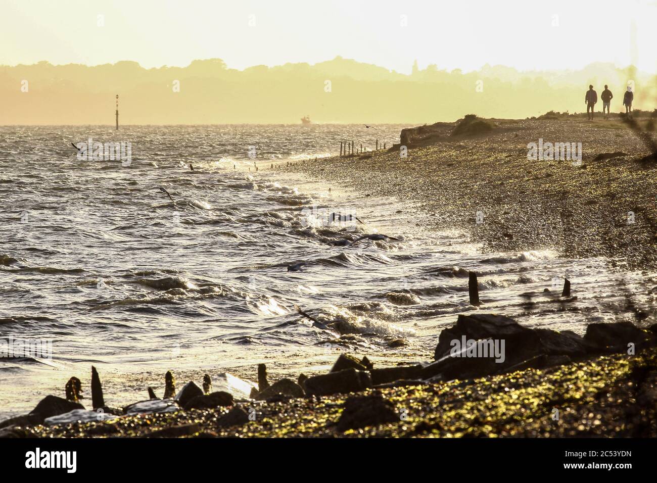 Sunset Beach walking Stock Photo - Alamy