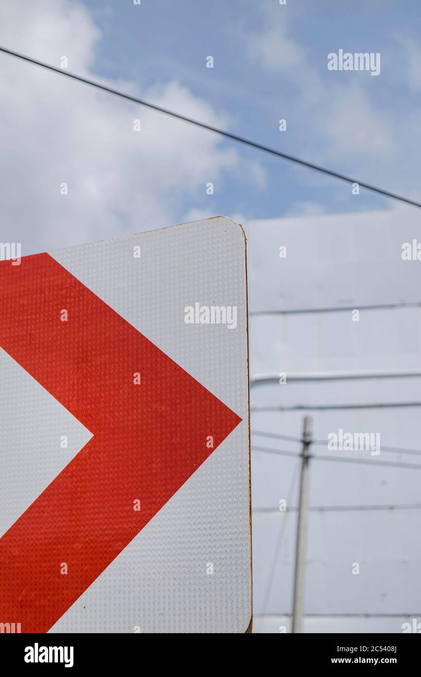 Part of a traffic sign directional guardrail against graphic background ...