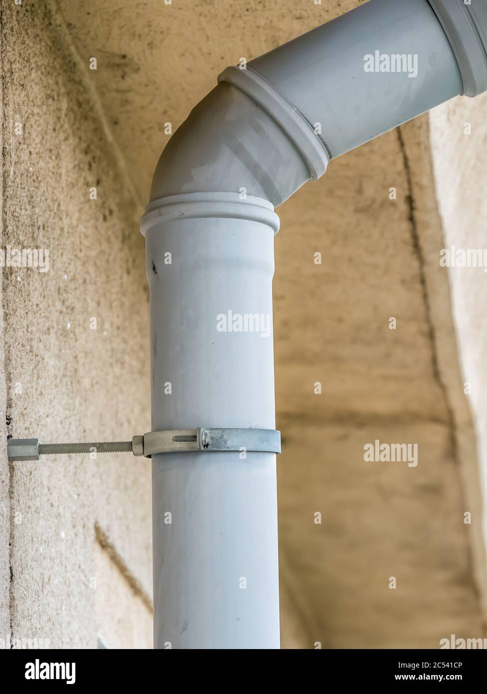 Close up with a drain system installation. Drainpipe on an apartment ...