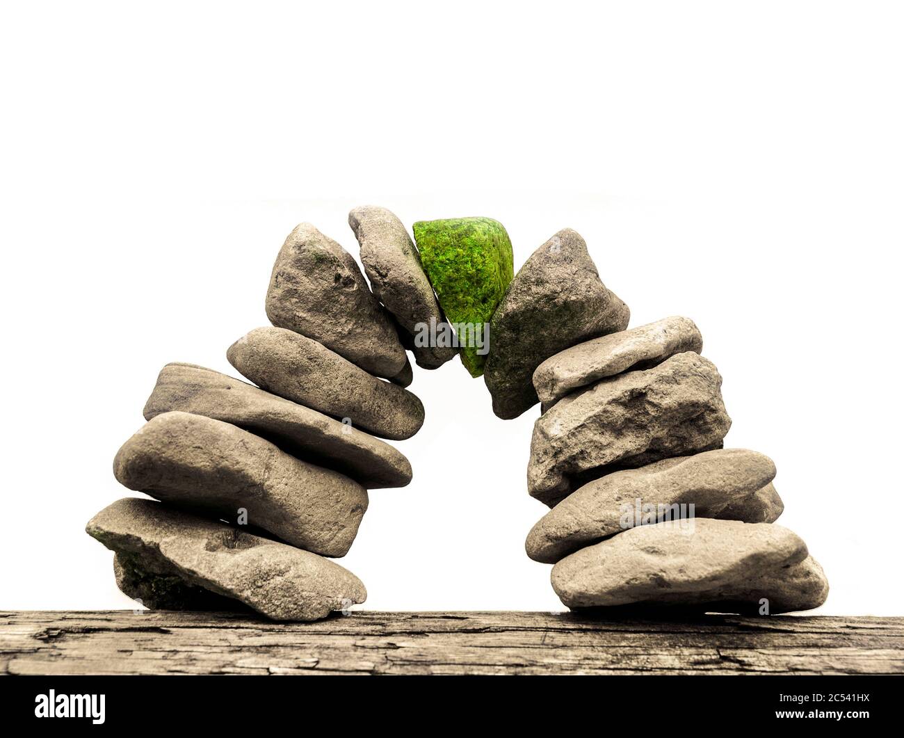 Stone bridge made of pebbles with green keystone Stock Photo - Alamy