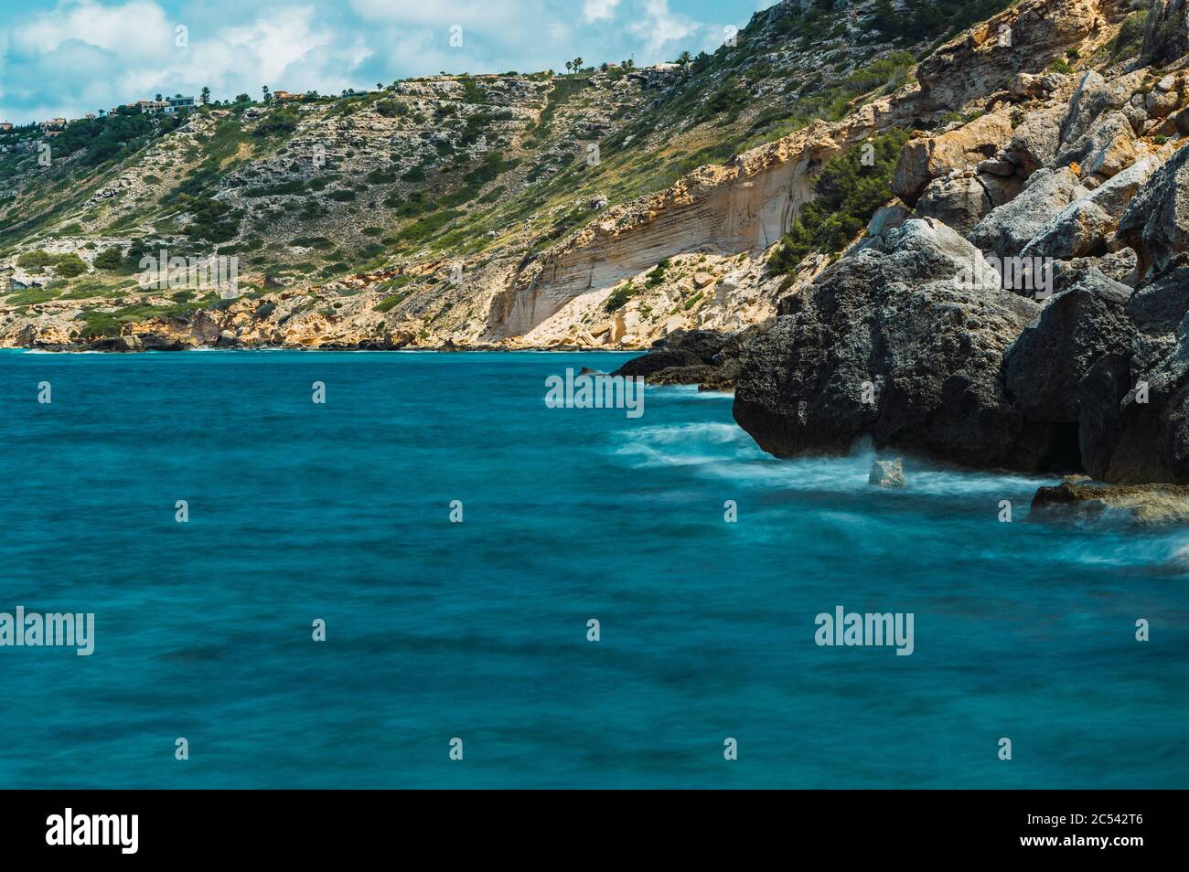 Rocks on the body of the sea near the village of Mallorca Stock Photo ...