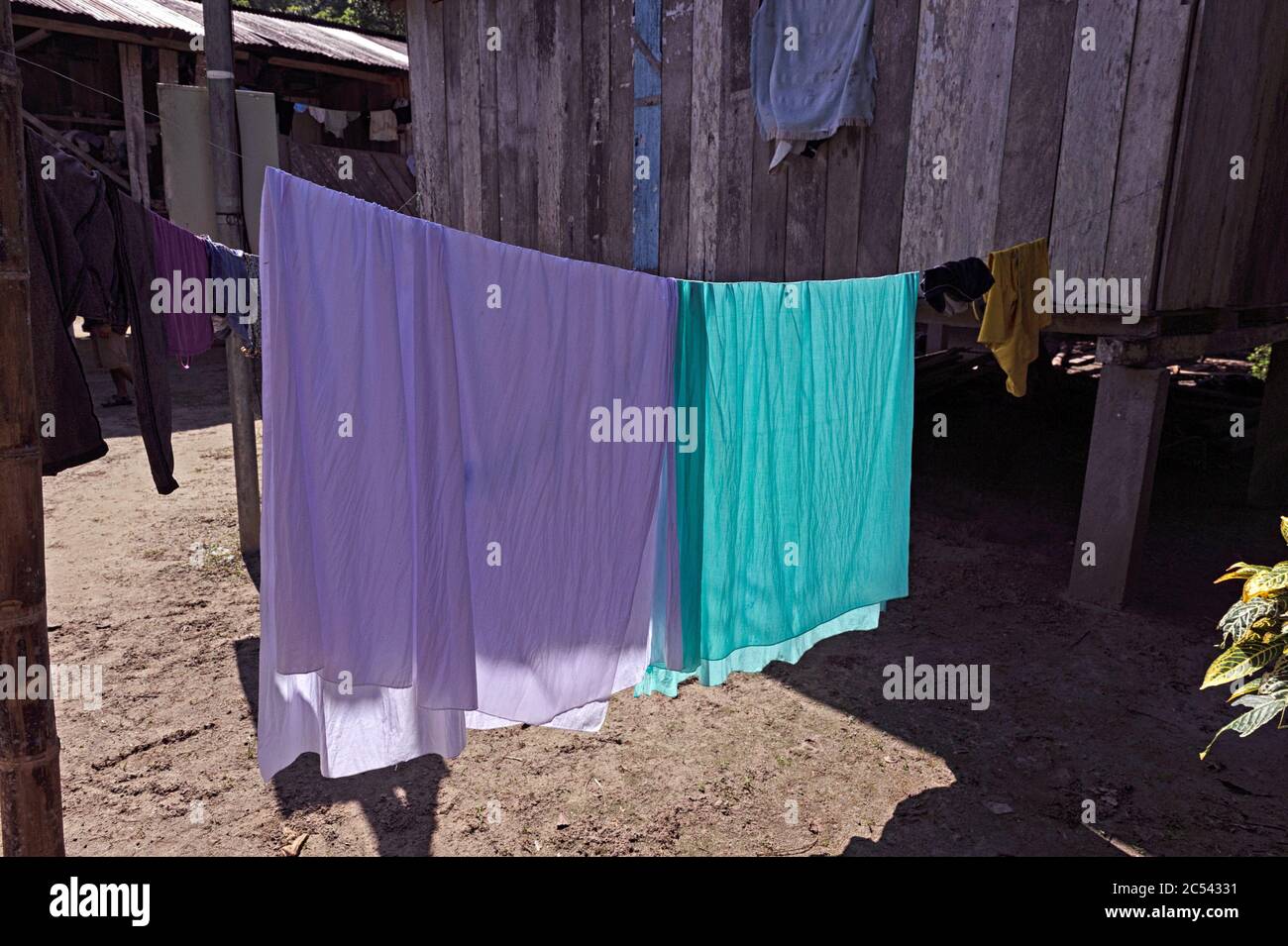 Clothes hanging on a clothesline in a Quechua tribe village Napa ...