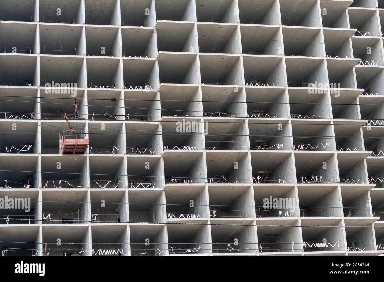The construction of a multi-storey building.Cell windows Stock Photo ...