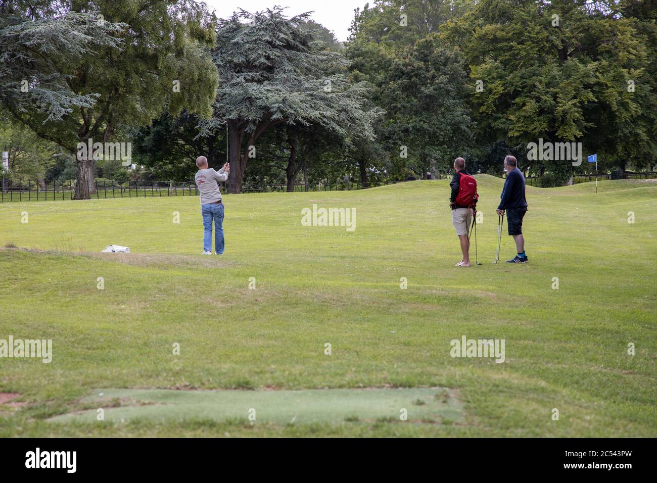 People playing golf at Abbey Park, Torbay Stock Photo - Alamy