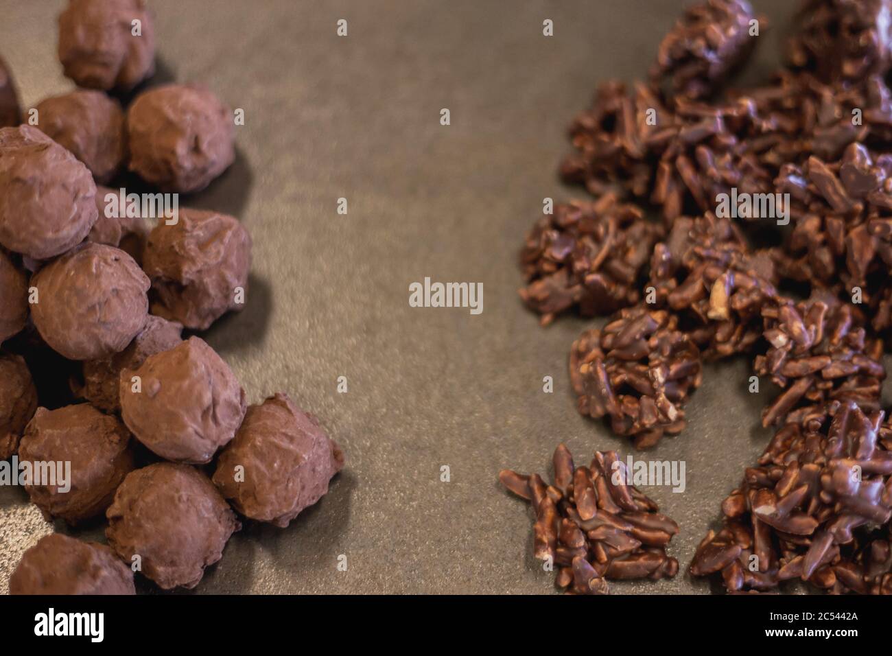 Closeup shot of two types of round chocolate candies Stock Photo - Alamy