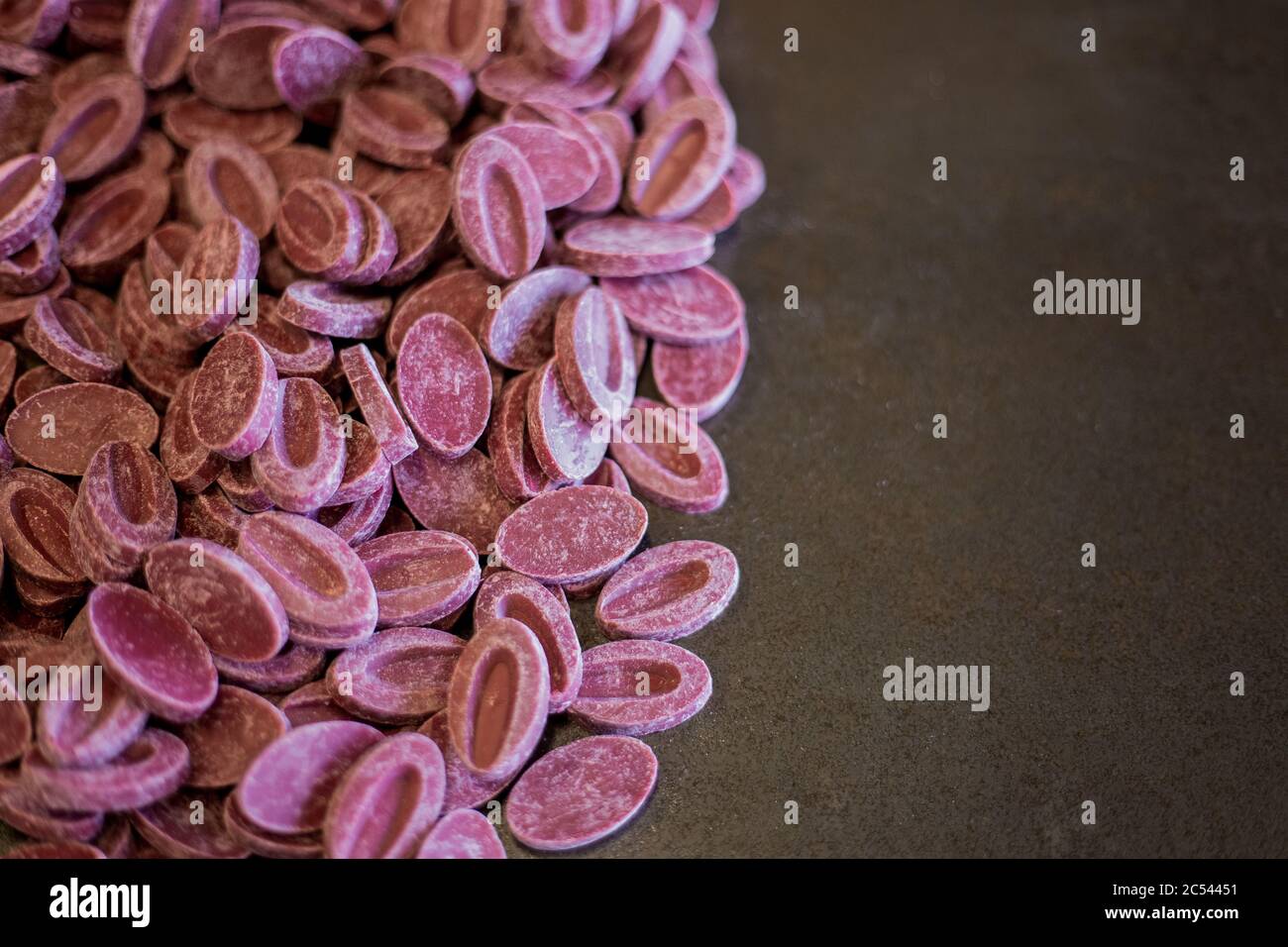 Closeup shot of pink round-shaped candies Stock Photo - Alamy