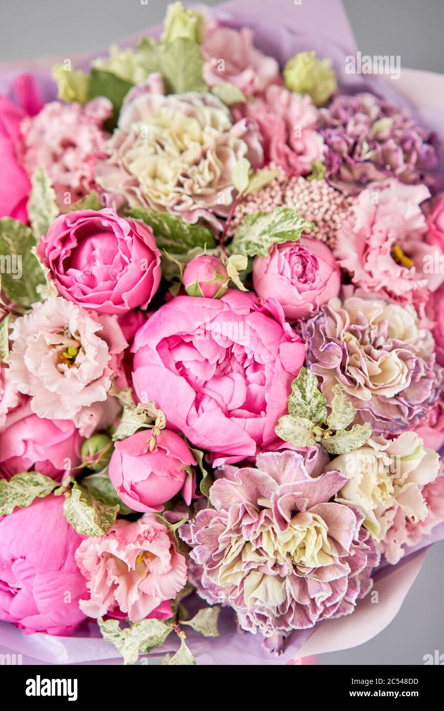 Beautiful bouquet of mixed flowers in woman hand. Floral shop concept ...
