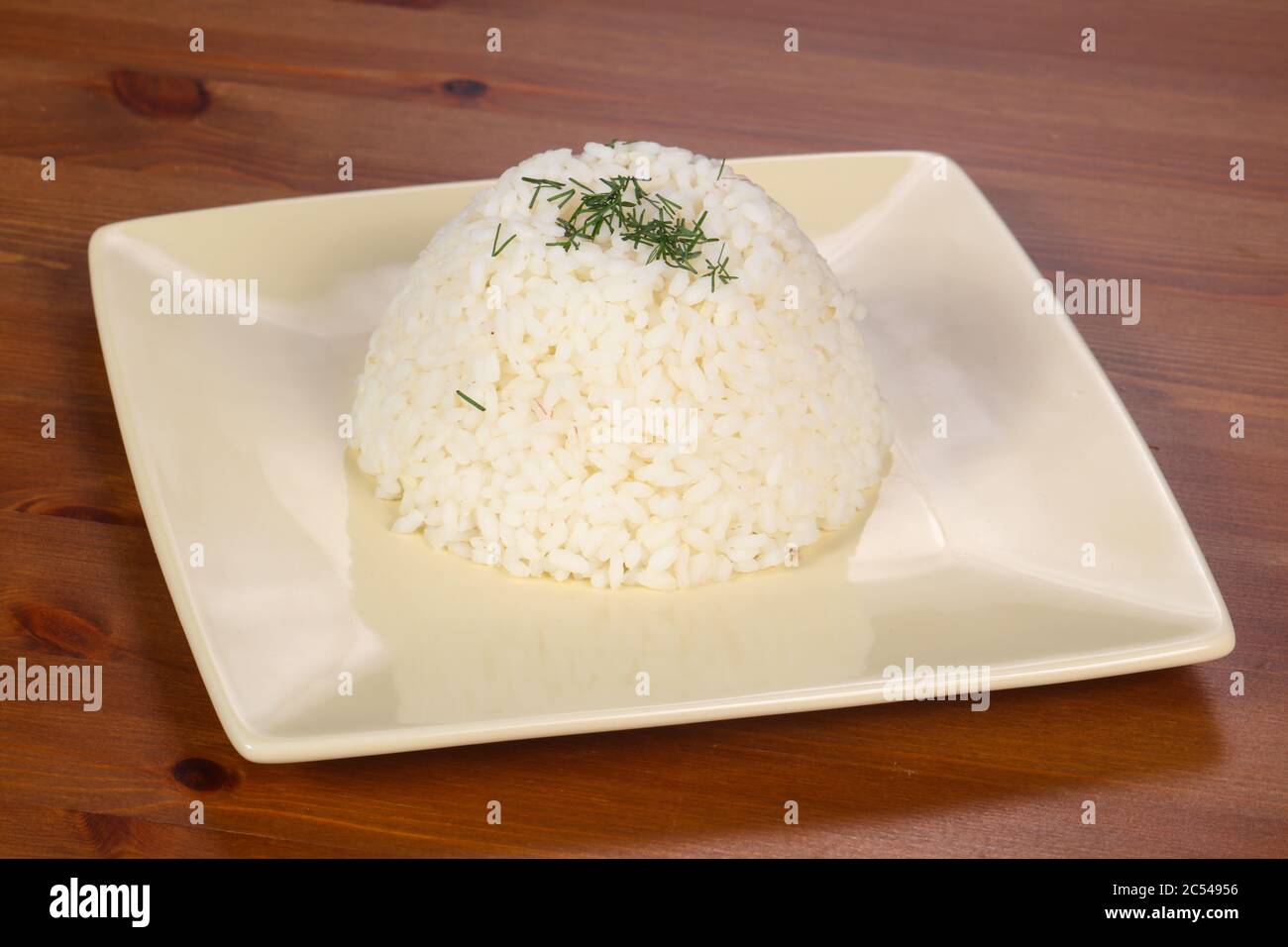 Steamed rice in the plate served dill Stock Photo - Alamy