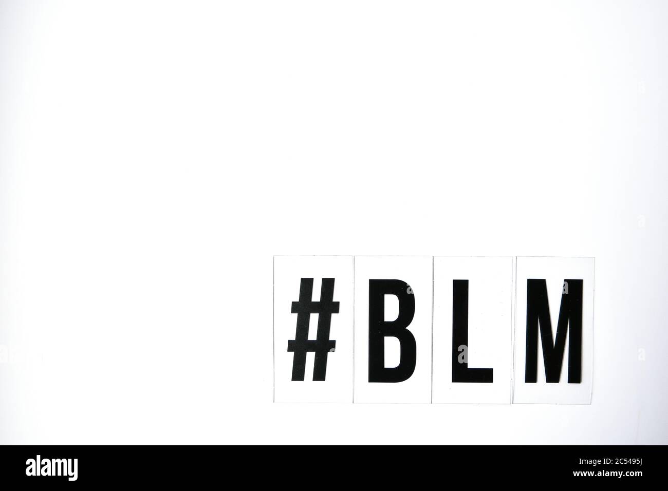 hashtag BLM BLACK LIVES MATTER text on a white background. Protest ...