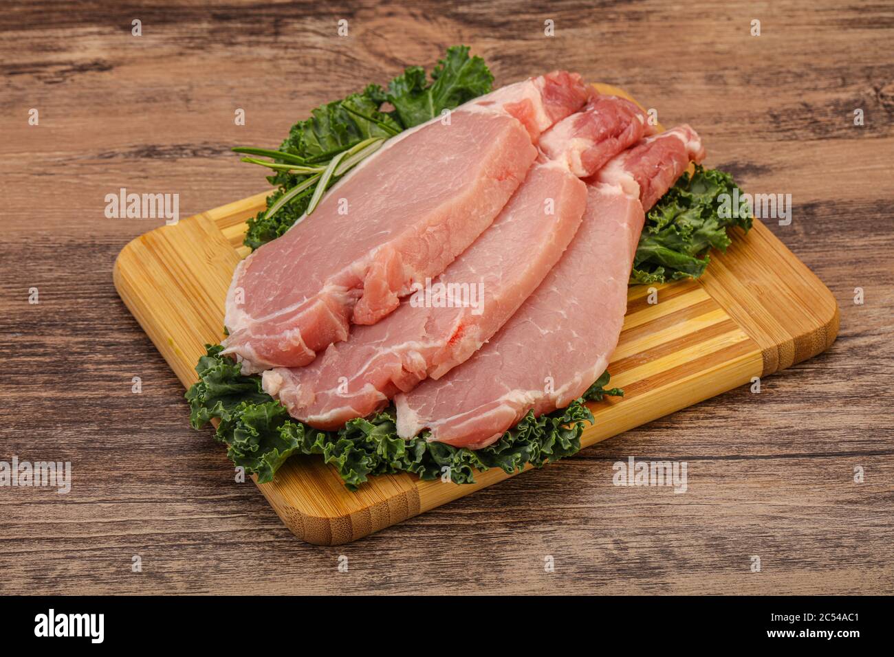 Raw pork meat steak for cooking Stock Photo - Alamy