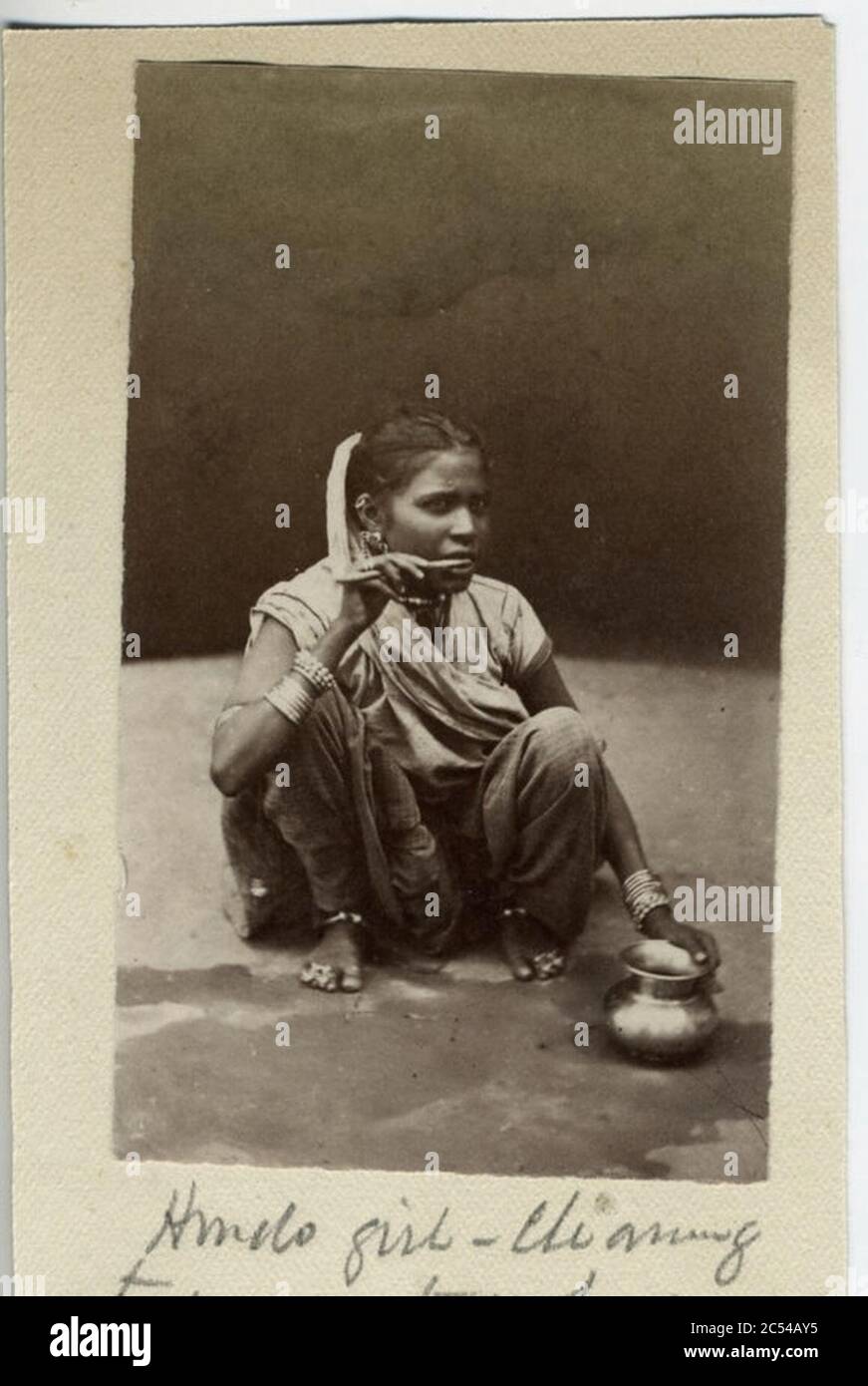 Indian Hindu woman cleaning teeth in the 1880s Stock Photo - Alamy