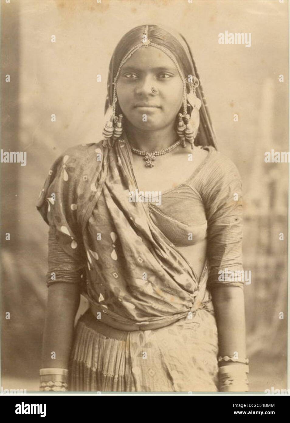Indian woman in sari and ornaments (c. 1880 Stock Photo - Alamy