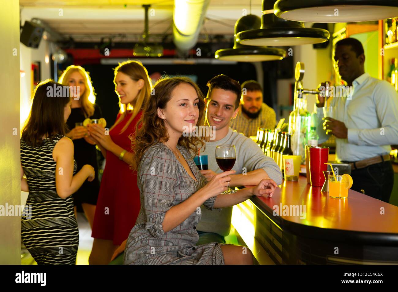 Meeting man and woman in an entertaining night club Stock Photo - Alamy