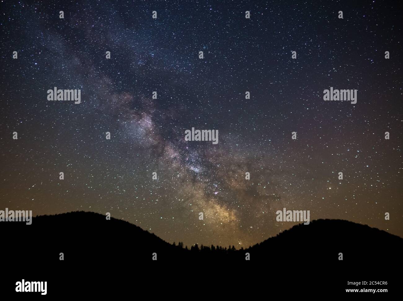 Milky Way Galaxy over the Forest at Night Stock Photo - Alamy