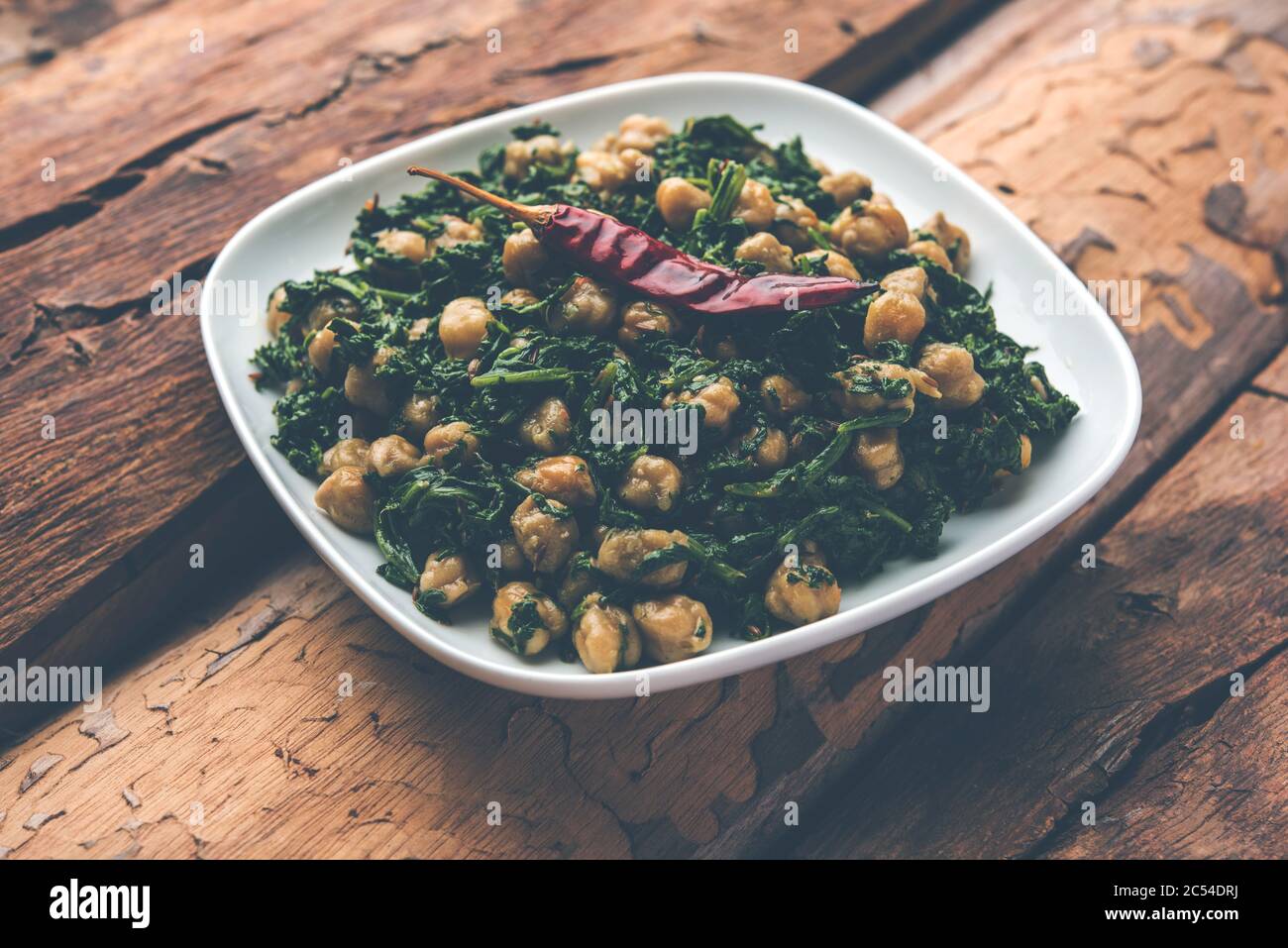 Palak Chana Sukhi Sabzi or Spinach Chickpea Dry recipe Stock Photo - Alamy