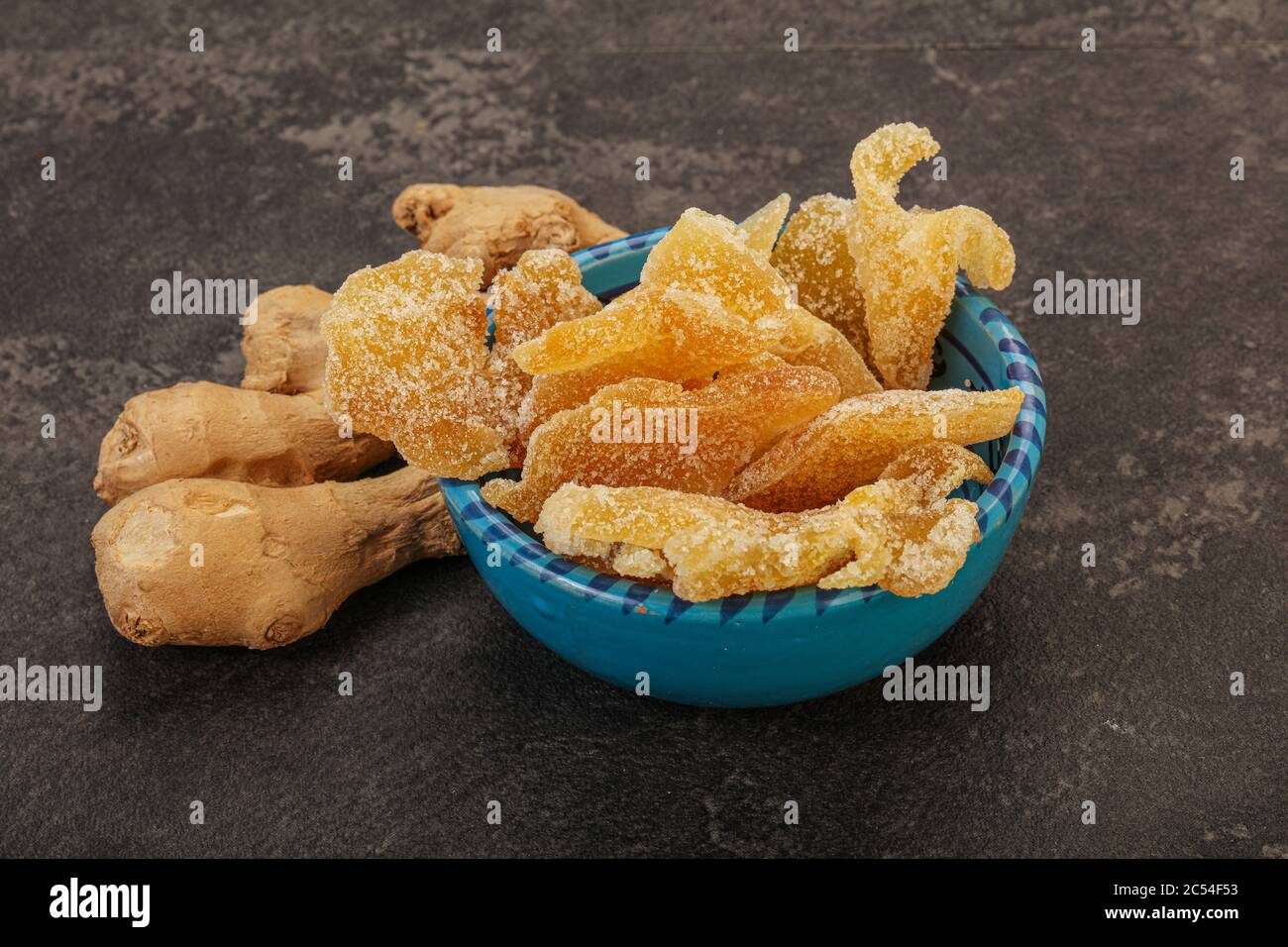 Dry sweet ginger snack in the bowl Stock Photo - Alamy