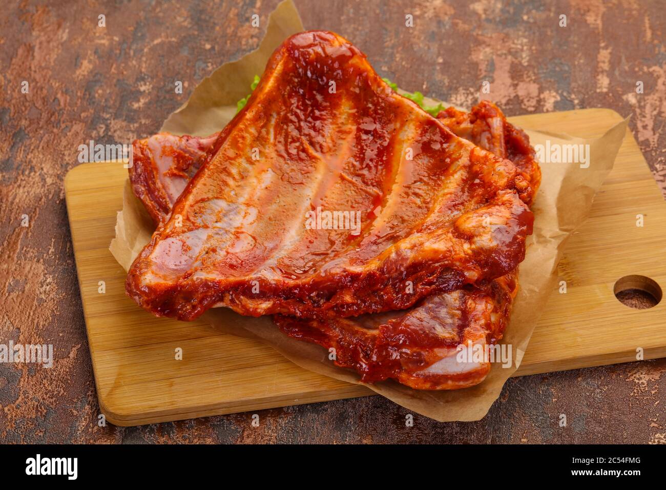 Raw marinated pork ribs ready for cooking Stock Photo - Alamy