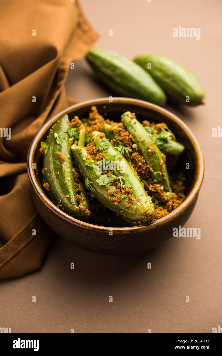 Indian style Bharwa Parwal dry Sabzi or Stuffed Pointed Gourd Dry fry ...