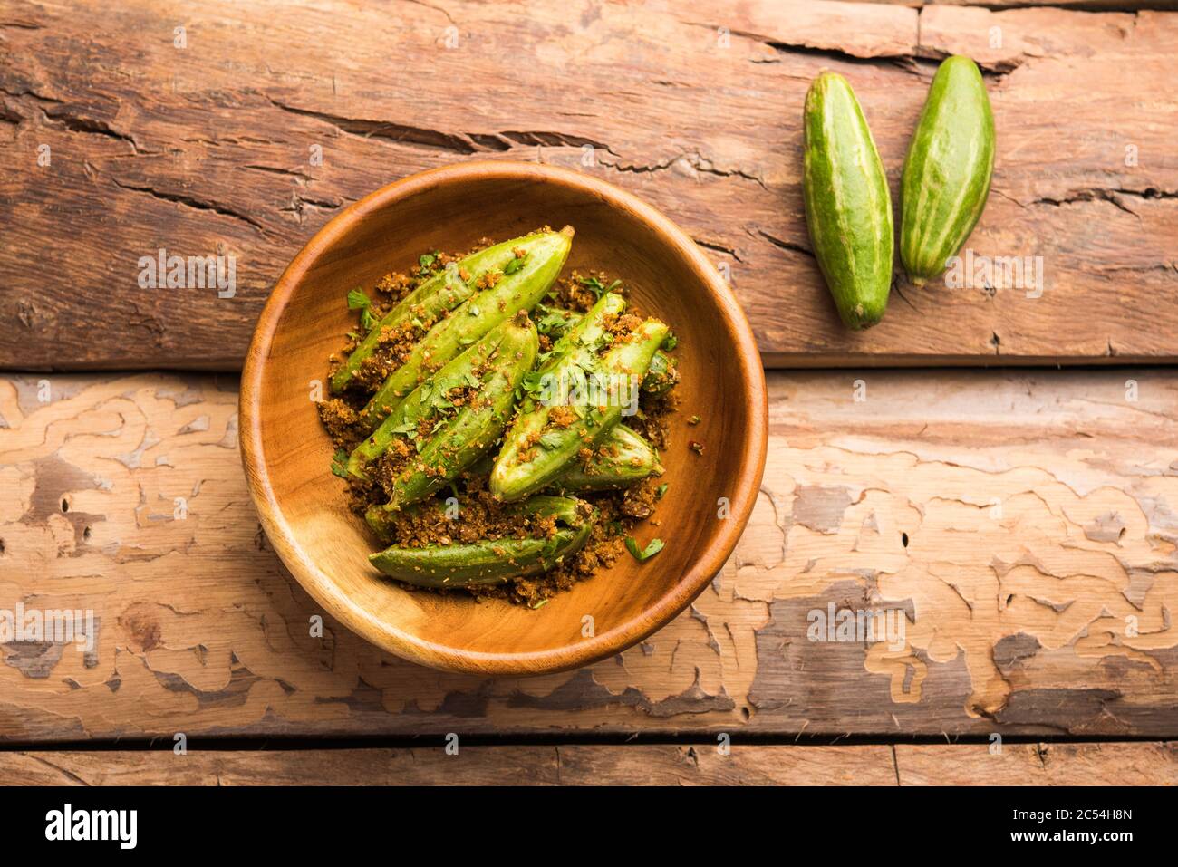 Indian style Bharwa Parwal dry Sabzi or Stuffed Pointed Gourd Dry fry ...