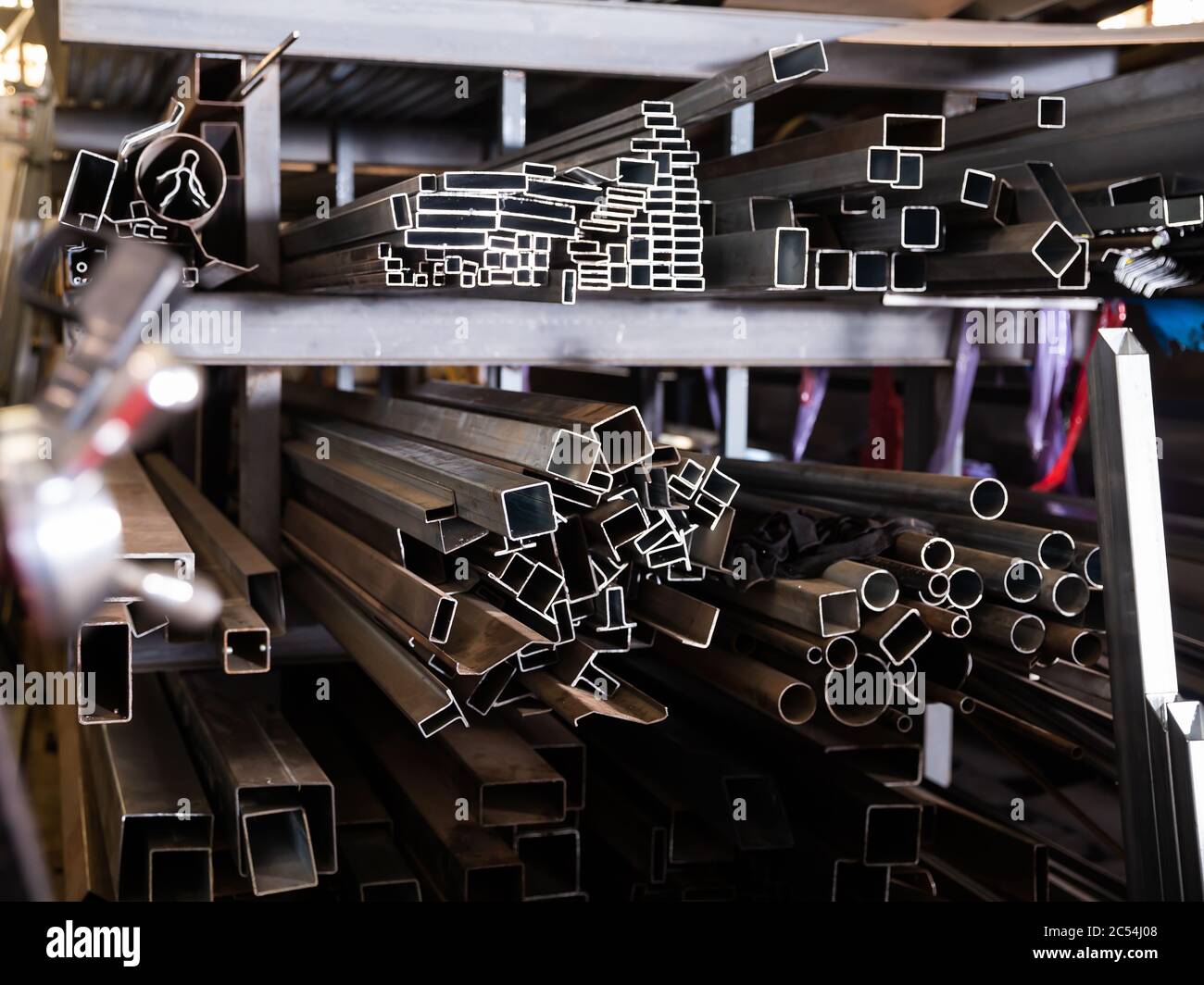 Stack of different metal pipes Stock Photo - Alamy