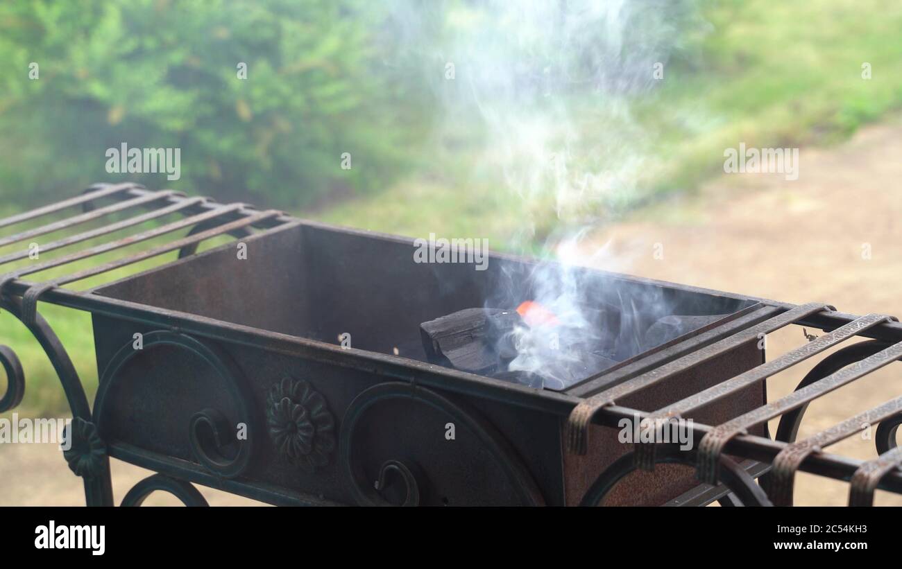 Lit barbecue hi-res stock photography and images - Alamy