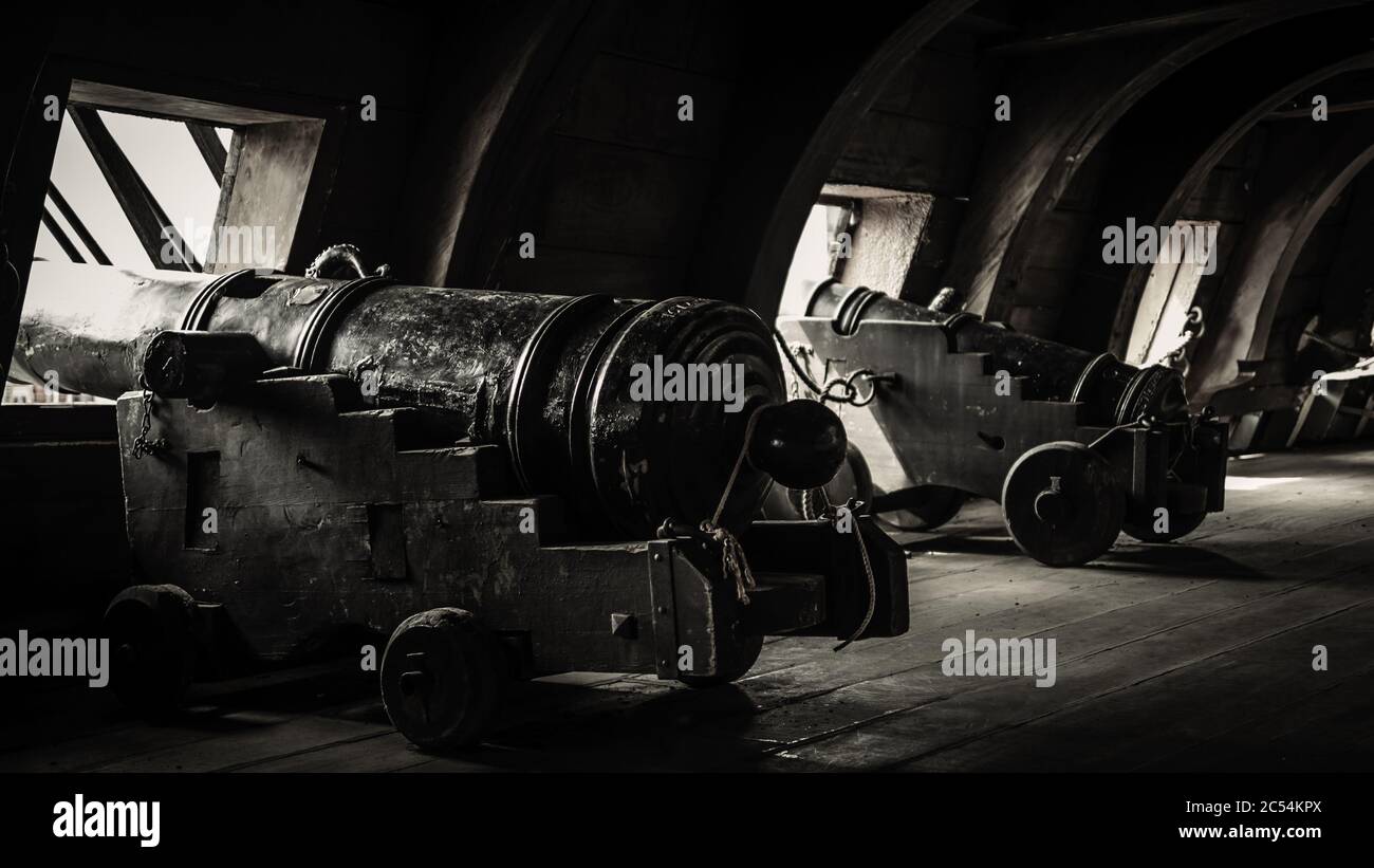 Grey scale shot of a ship's gun port from the inside Stock Photo - Alamy