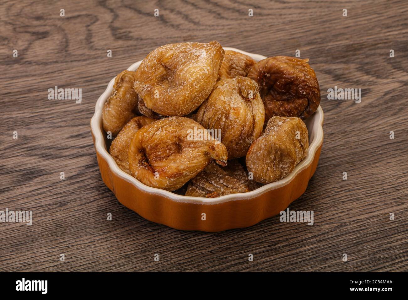 Dry sweet fig fruit heap snack Stock Photo - Alamy