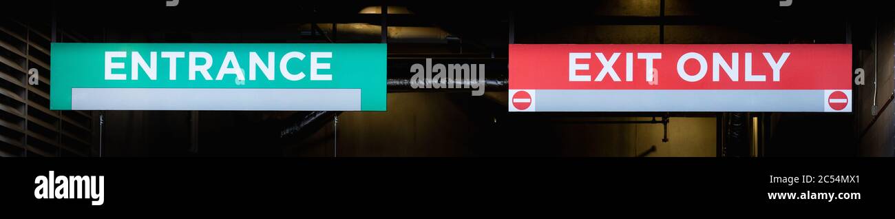green entrance and red exit signs banner Stock Photo - Alamy