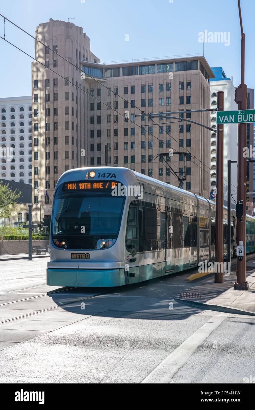 Phoenix, AZ - Nov. 30, 2019: Valley Metro light rail vehicle uses a ...