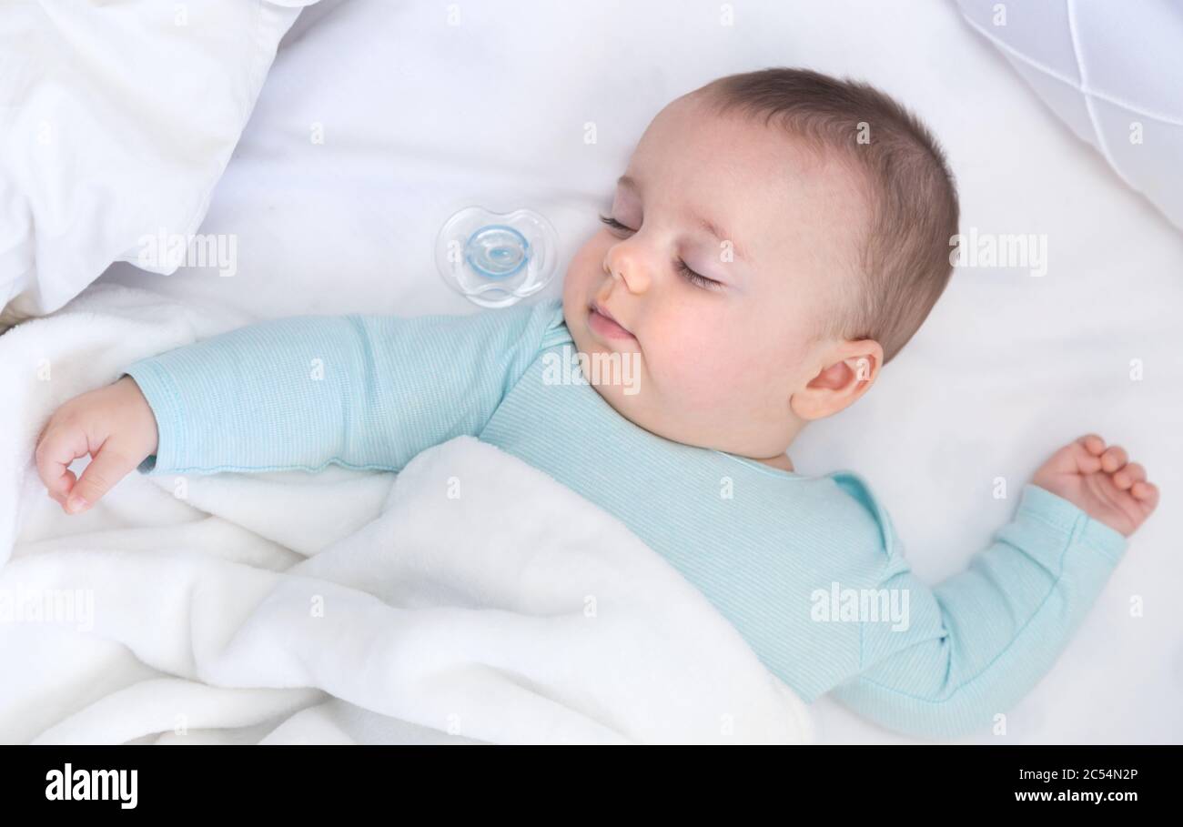 Dummy pacifier child asleep sleep hi-res stock photography and images ...