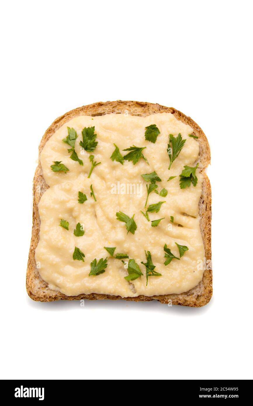 Slice of bread with spread on top isolated over white background Stock ...