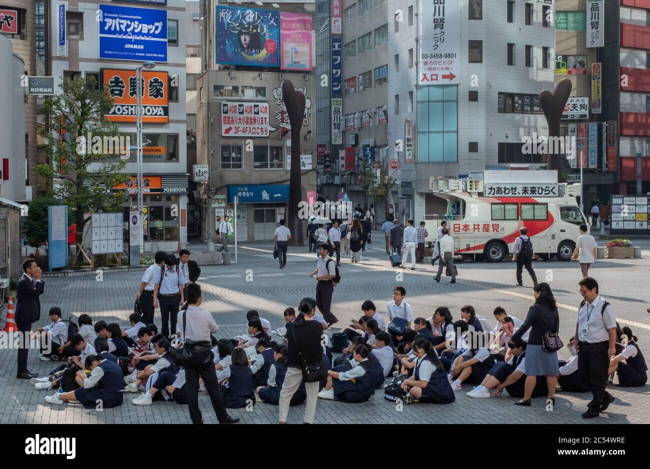 Japanese high school student at Shinagawa Station square, Tokyo, Japan ...
