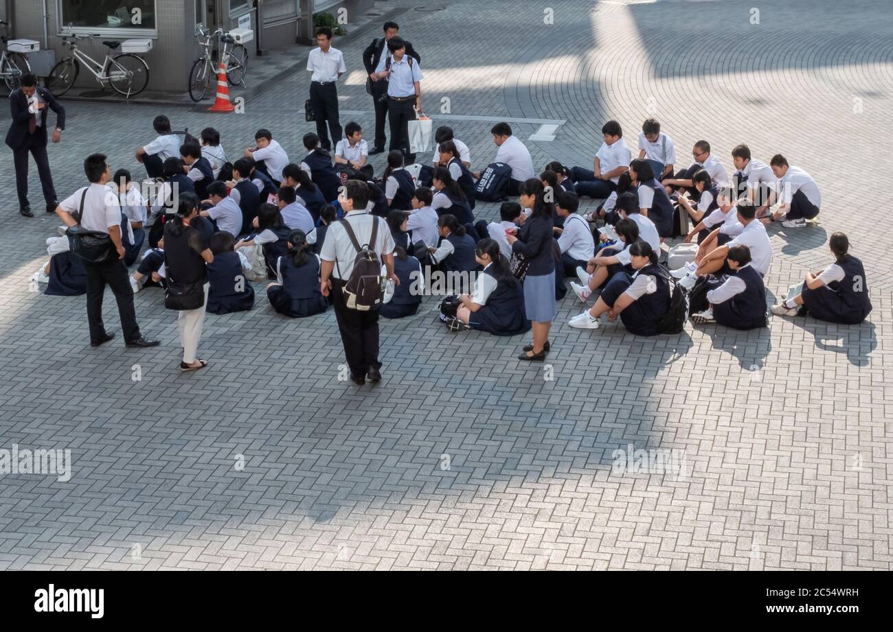 Japanese high school student at Shinagawa Station square, Tokyo, Japan ...