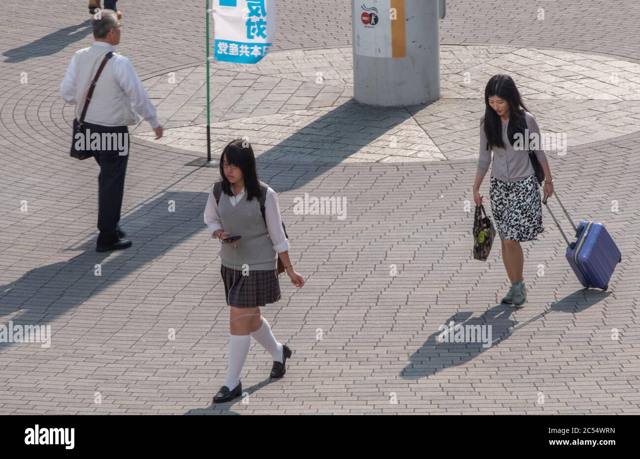 Japanese high school student at Shinagawa Station square, Tokyo, Japan ...
