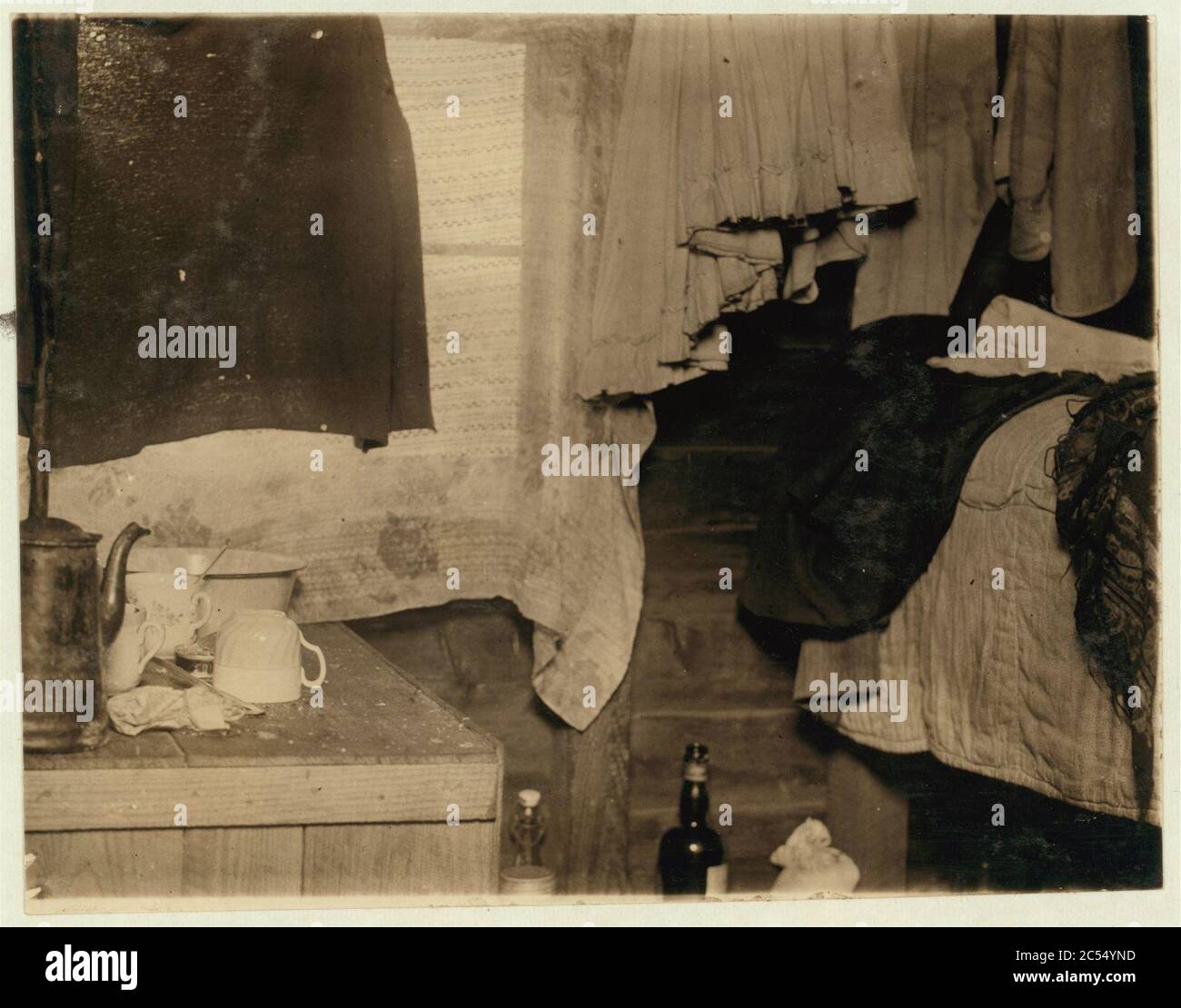 Interior of one of the living rooms in shack used by pickers on ...