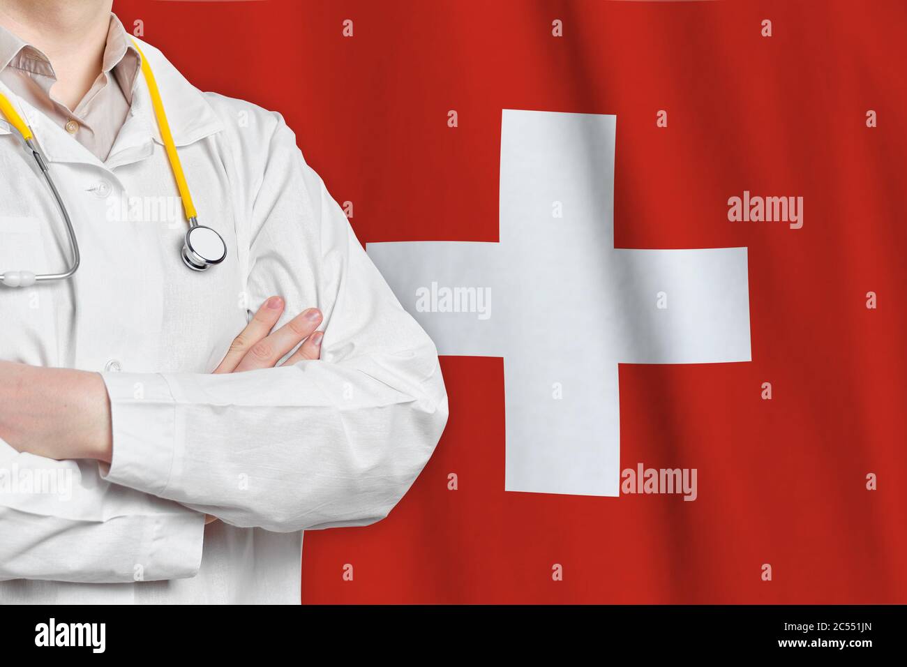 Swiss Confederation healthcare concept with doctor on Switzerland flag ...