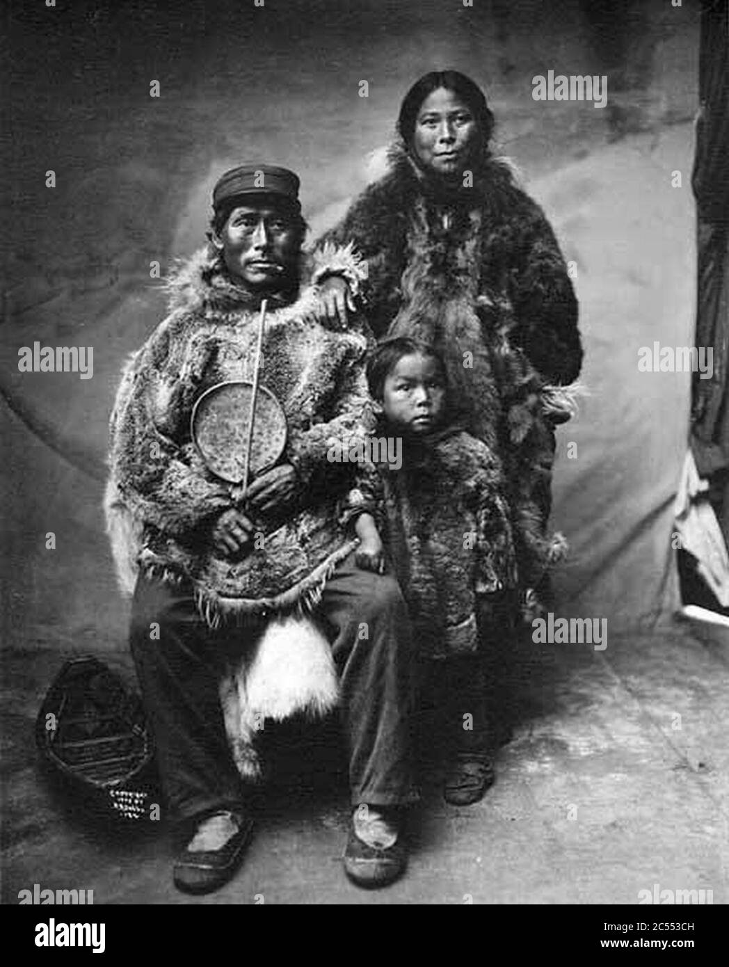 Inuit man woman and child in fur parkas Alaska 1903 (AL+CA 2368 Stock ...
