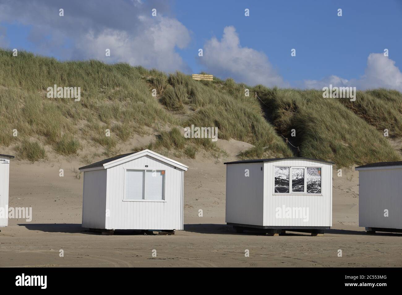 White beach cabins at Lokken beach, Denmark Stock Photo - Alamy