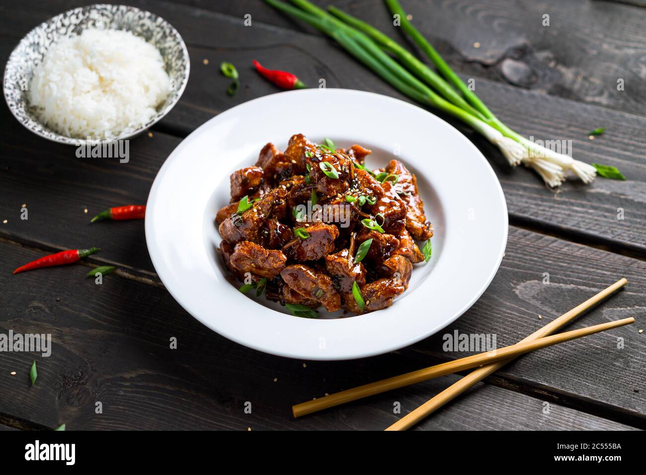 General Tso Chicken plate on dark background. General Tso's chicken ...