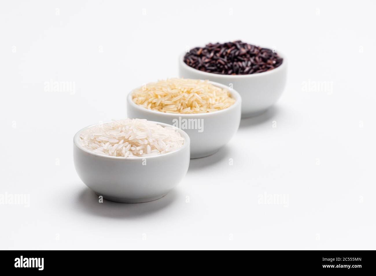 Rice the staple food of the world. 3 varieties of rice, white jasmin ...