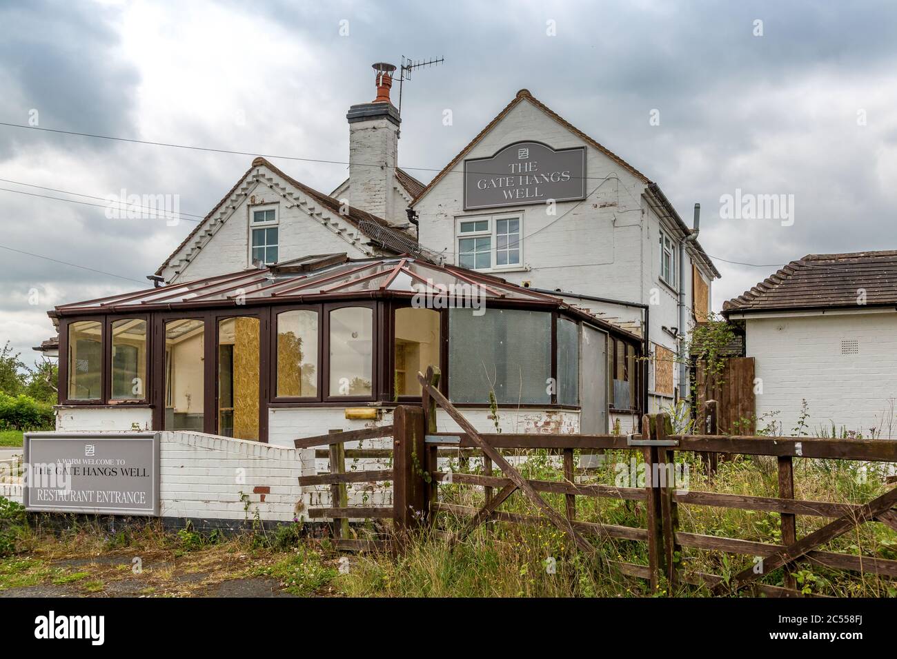 Derelict and ready for demolition The Gate Hangs Well in Woodgate near ...