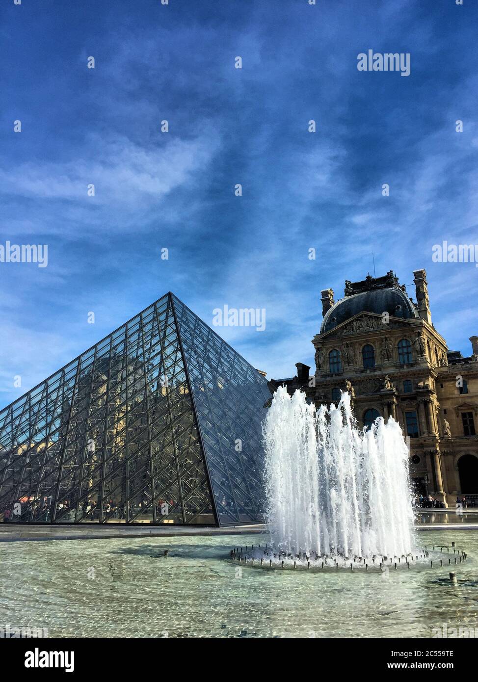 Glass pyramid at the Louvre in the center of Paris Stock Photo - Alamy