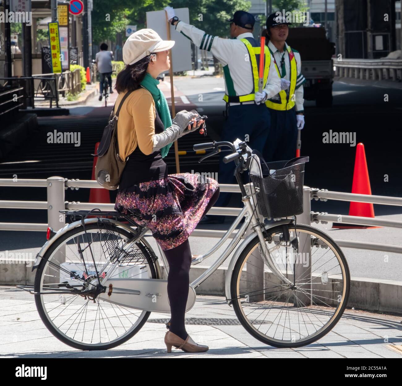 People riding bicycle at Shibuya street, Tokyo, Japan Stock Photo - Alamy
