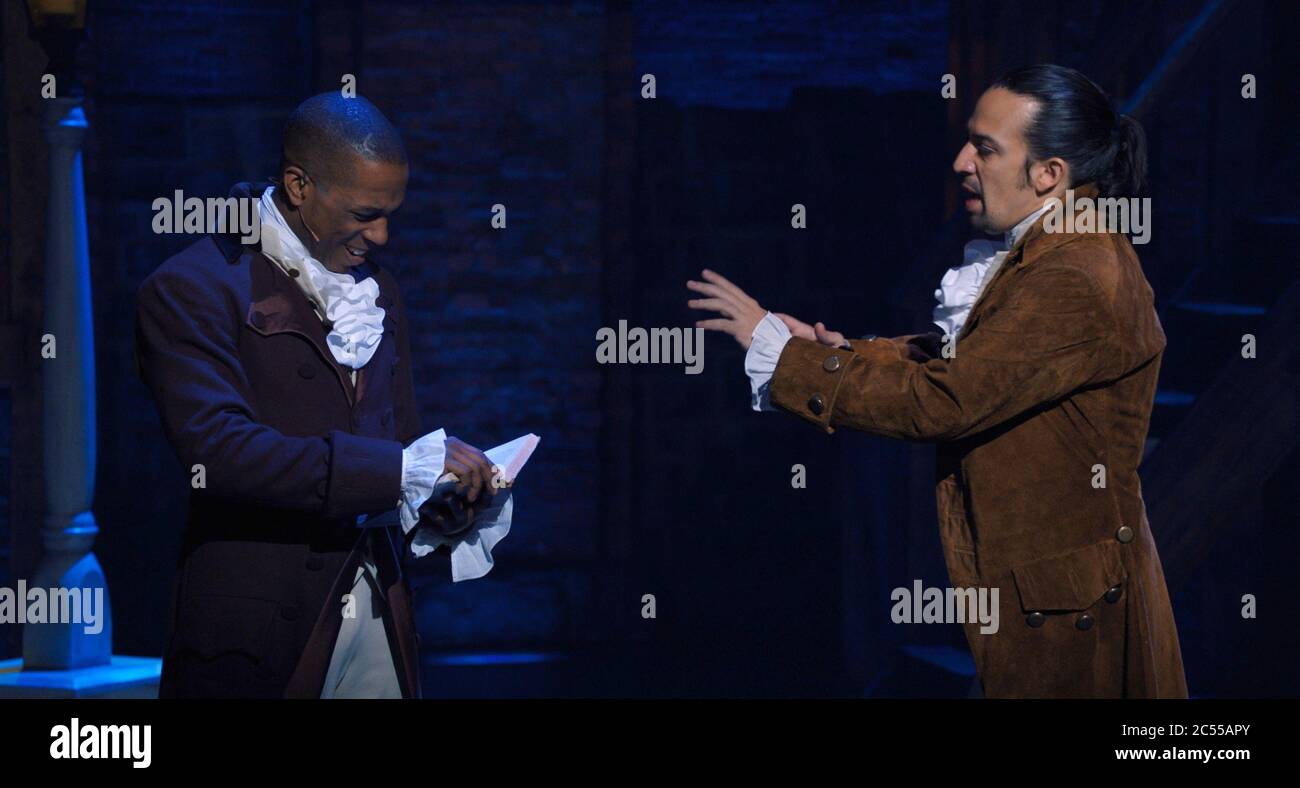 HAMILTON, from left: Leslie Odom Jr. as Aaron Burr, Lin-Manuel Miranda as Alexander Hamilton ...